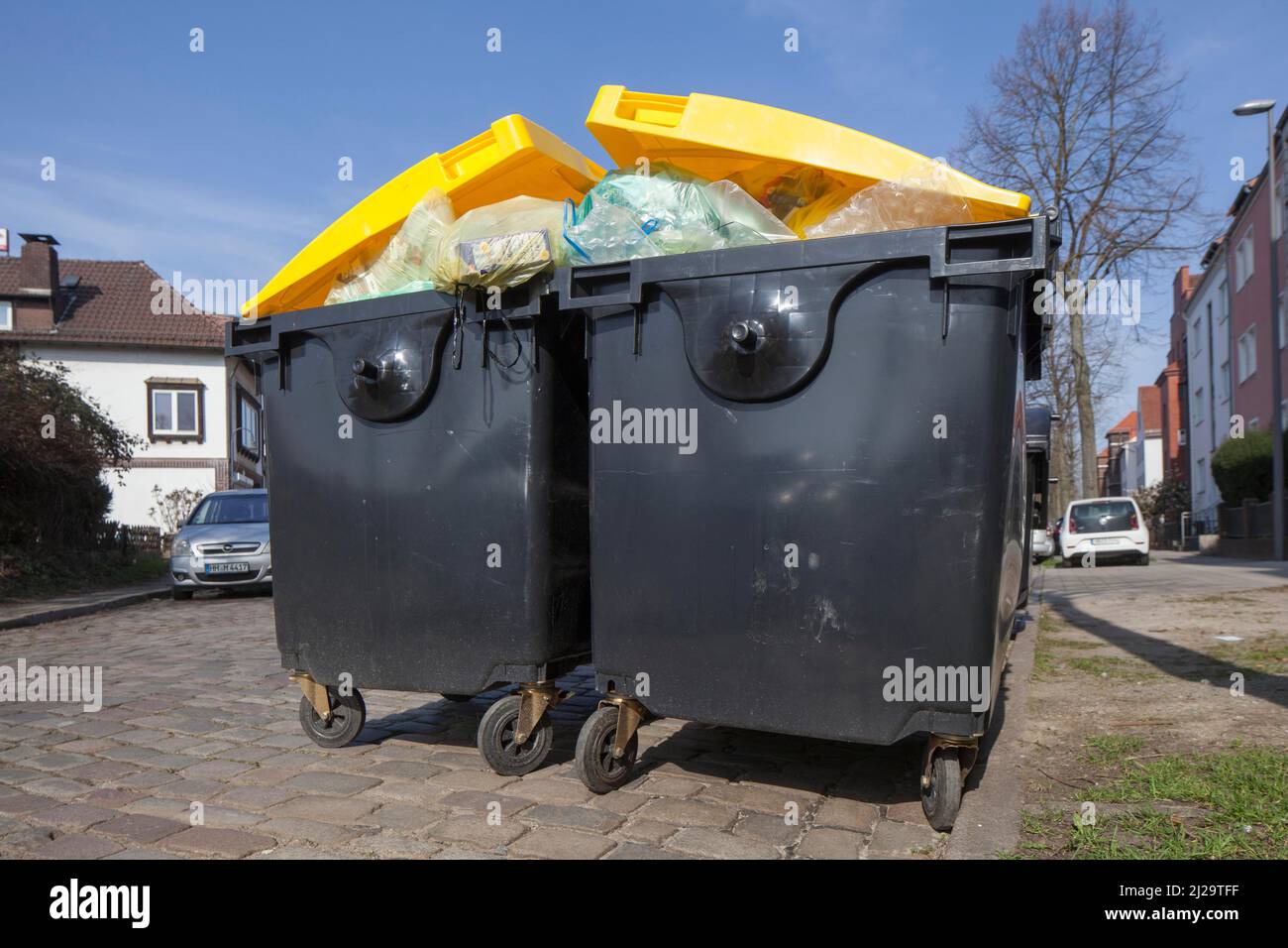 Yellow bin for plastic waste, waste separation, Germany Stock Photo - Alamy