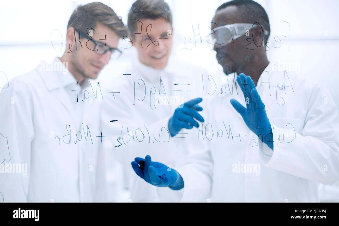 Group scientists analyzing results hi-res stock photography and images ...