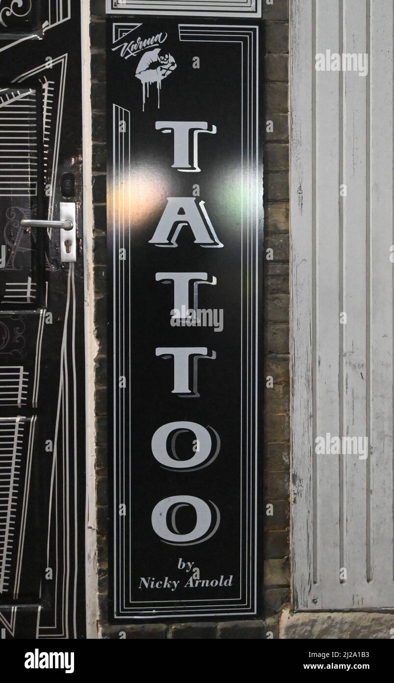 tattoo parlour sign, bury st edmunds, england Stock Photo - Alamy