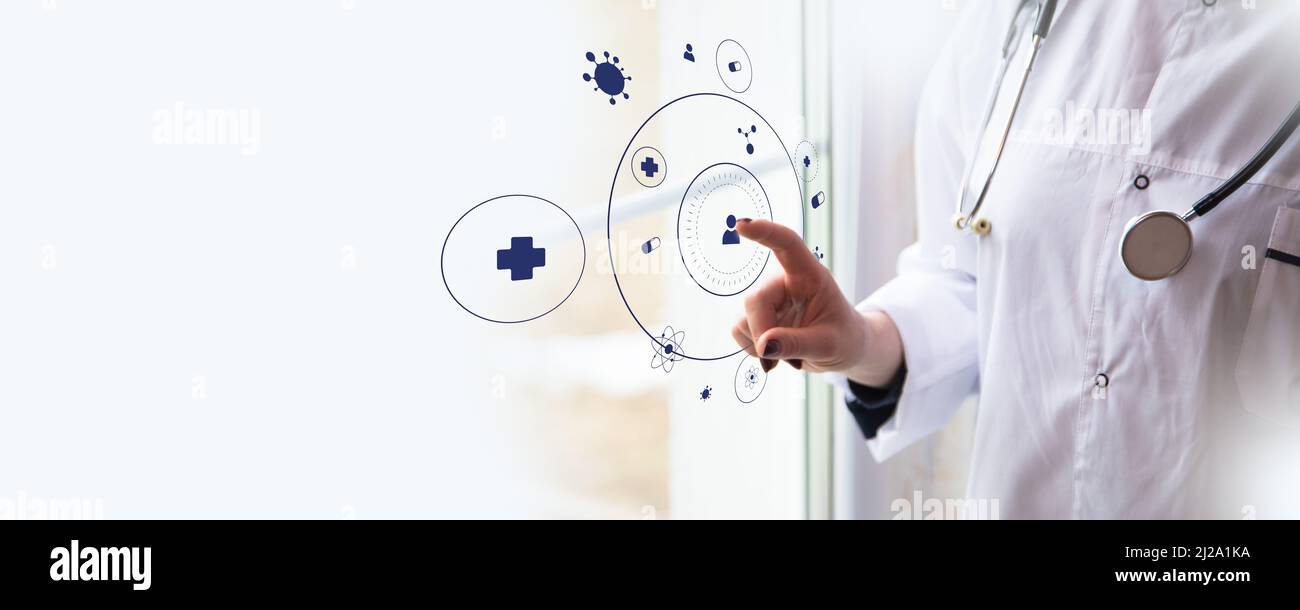 Doctor working on a virtual screen behind the structure of medical ...