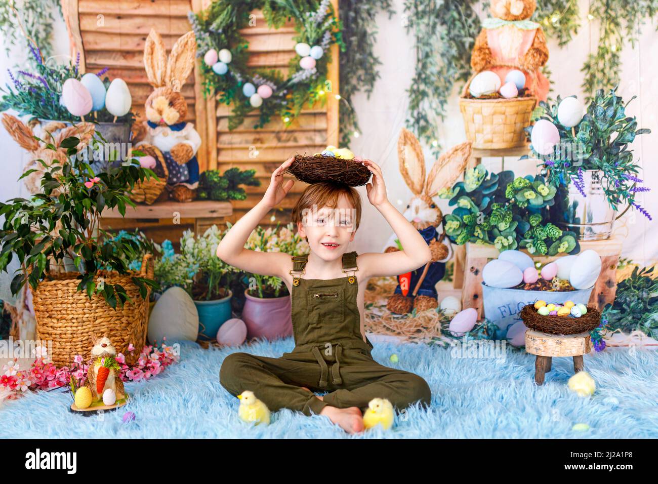 Kid on Easter egg hunt. Easter holidays Stock Photo - Alamy