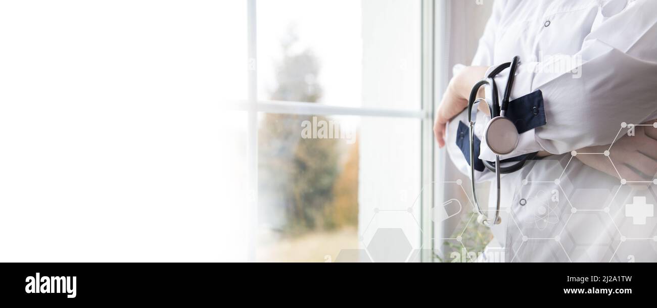Doctor working on a virtual screen behind the structure of medical ...