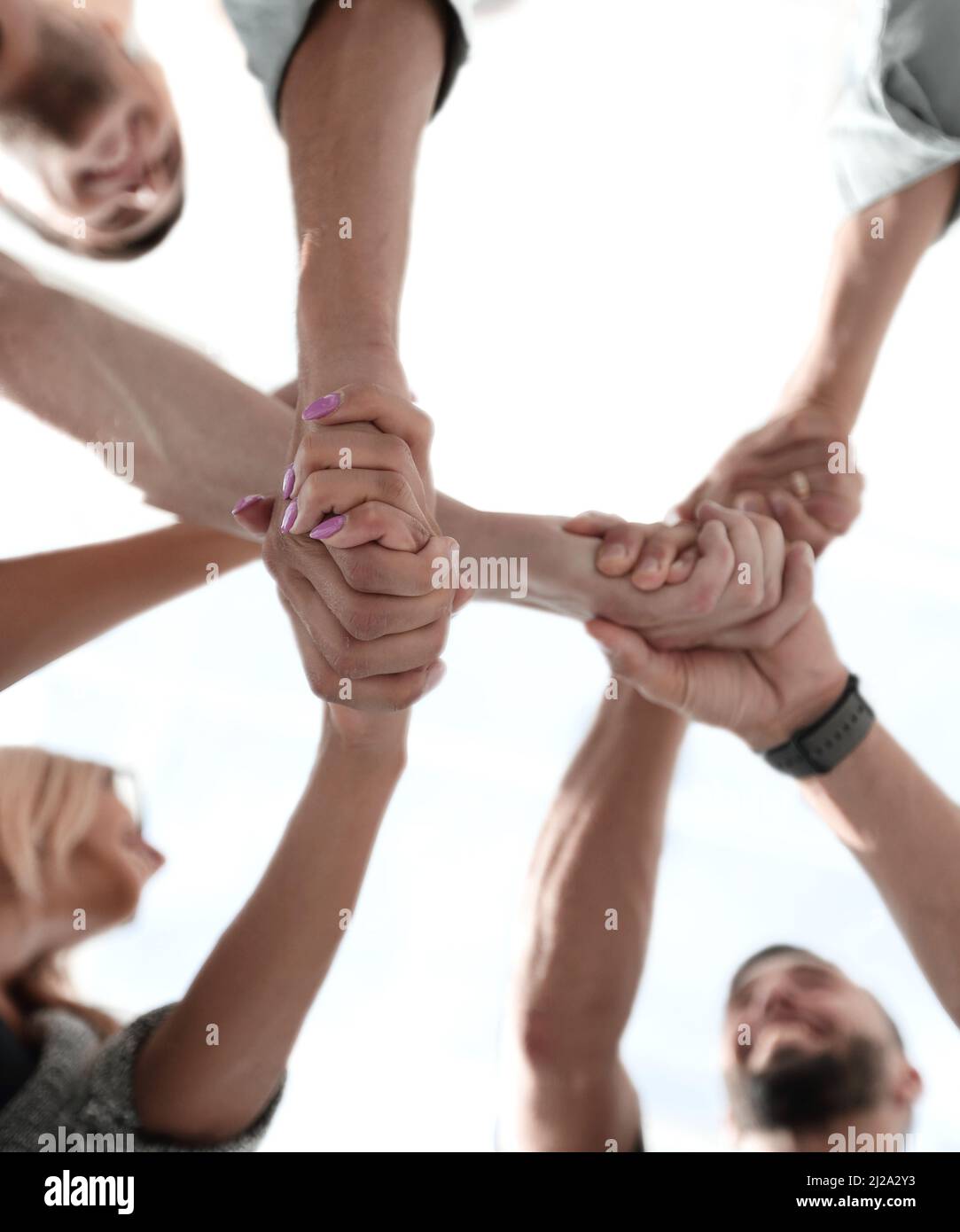 United hands on white background Stock Photo - Alamy
