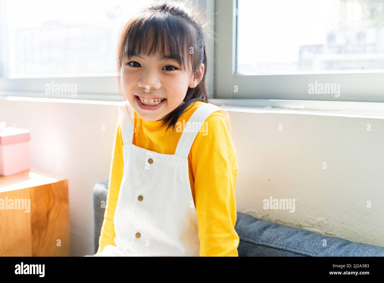 Portrait of Asian child at home Stock Photo - Alamy