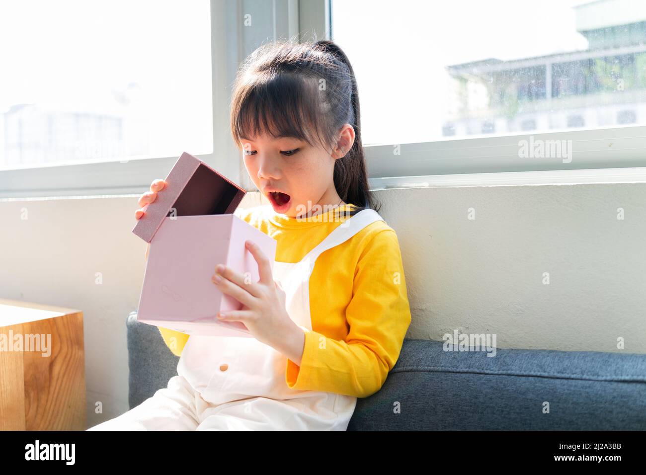 Portrait of Asian child at home Stock Photo - Alamy