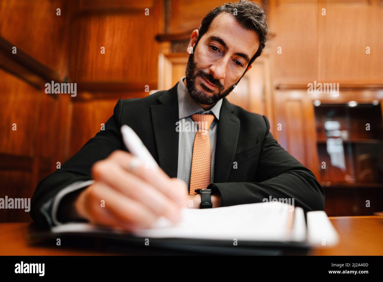 Communication signing document sitting holding hi-res stock photography ...