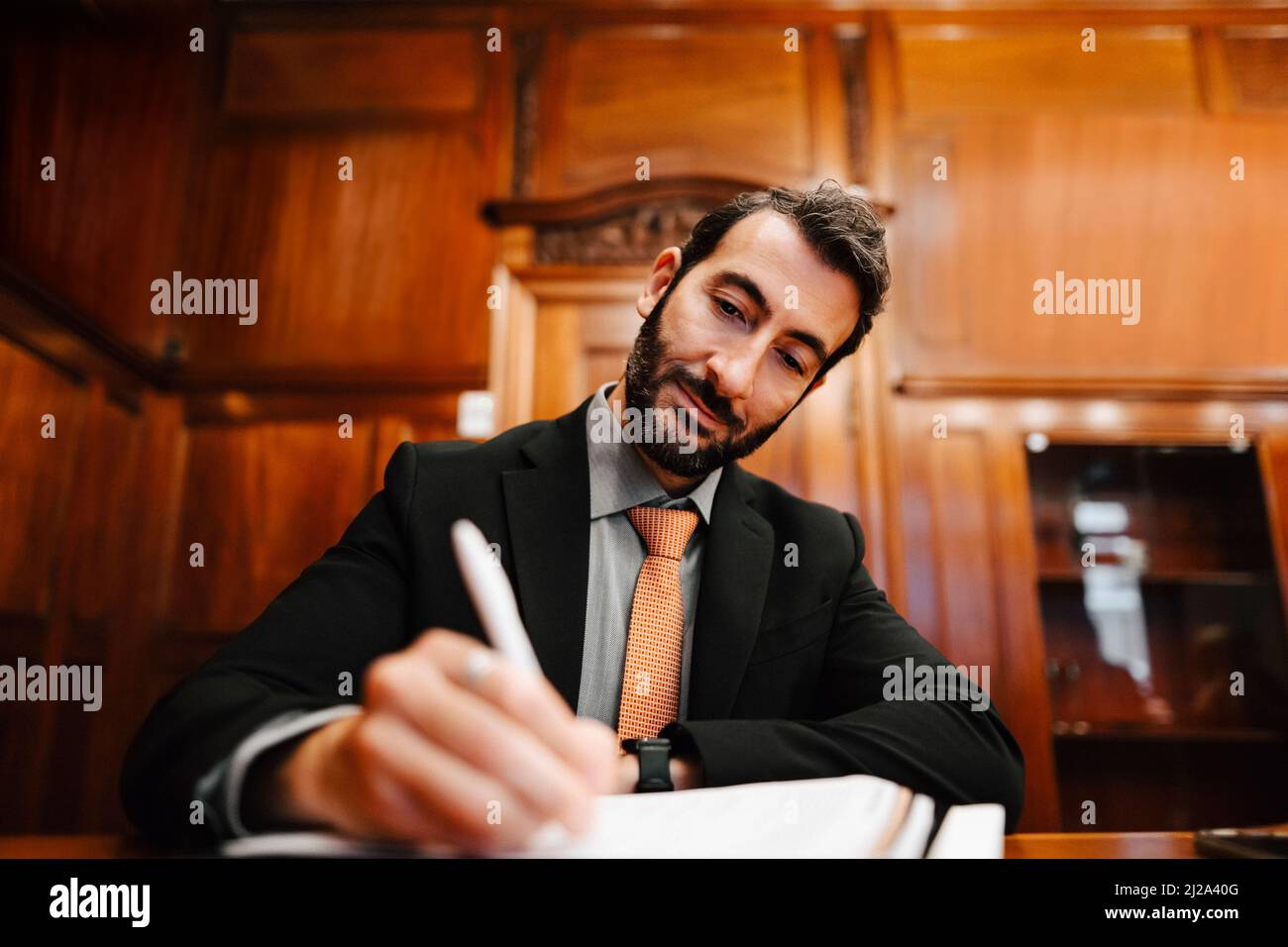 Communication signing document sitting holding hi-res stock photography ...