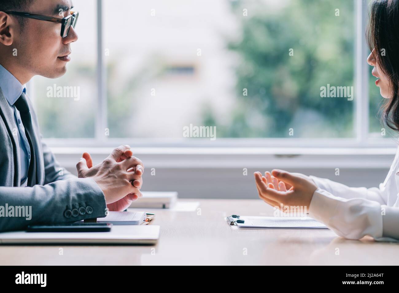 Asian male director is interviewing to recruit new employees Stock ...