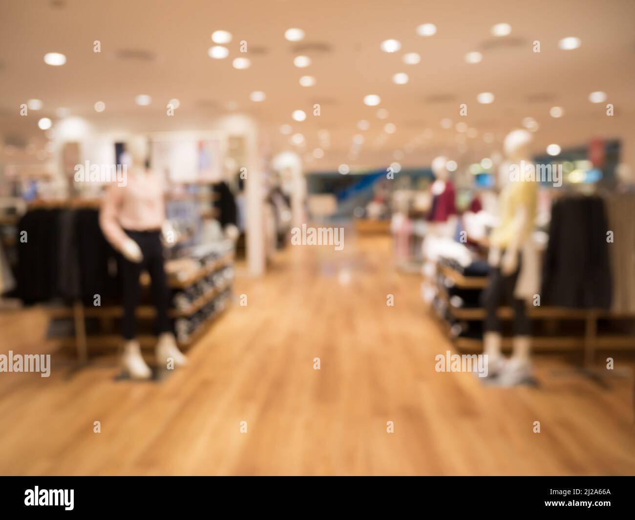 blur clothing store background in shopping mall Stock Photo - Alamy