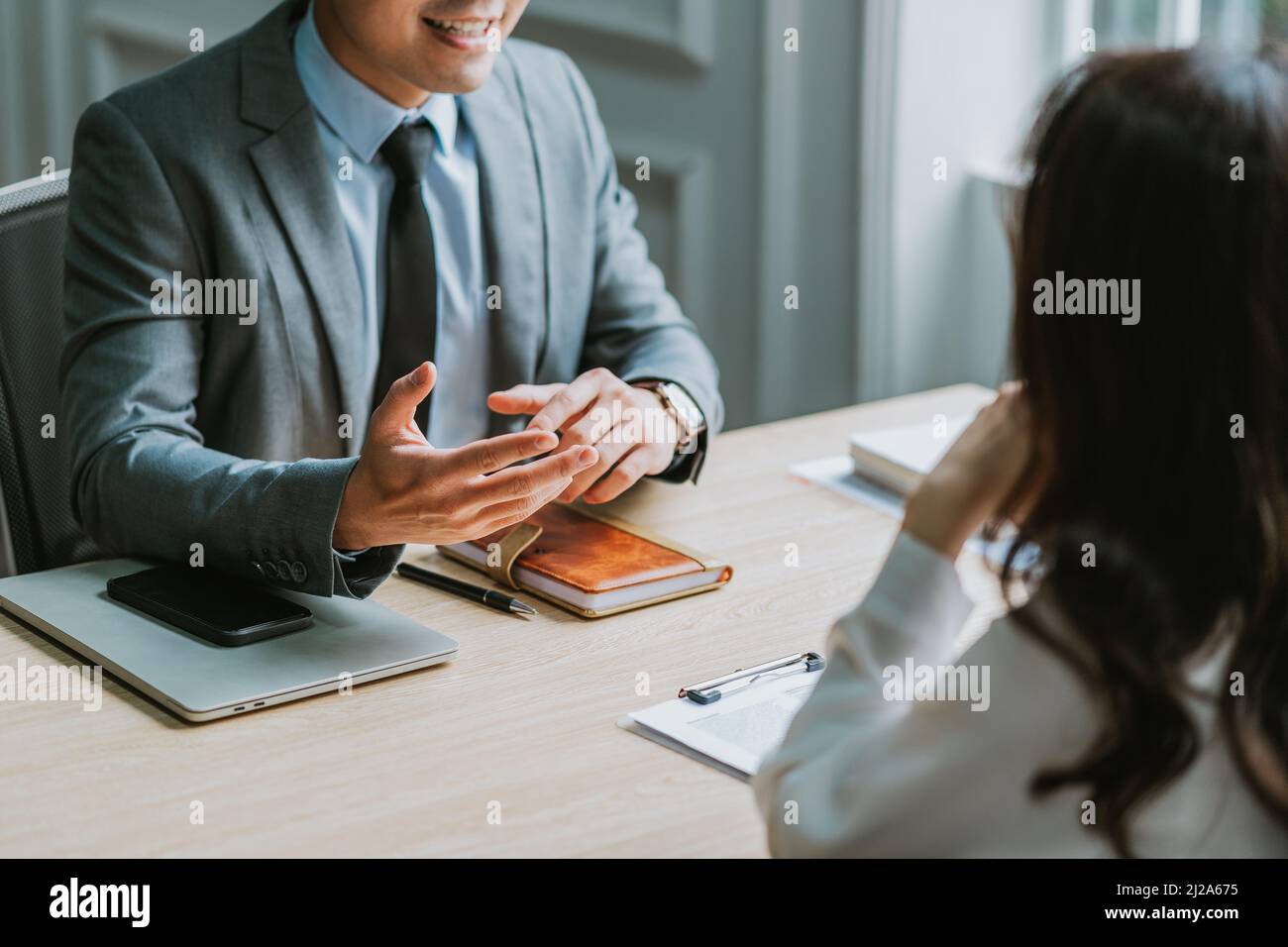 Asian male director is interviewing to recruit new employees Stock ...