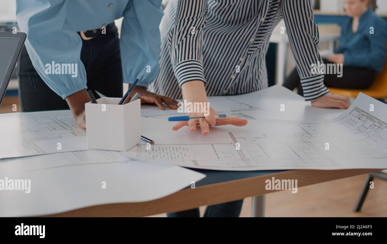 Close up architects analyzing blueprints hi-res stock photography and ...