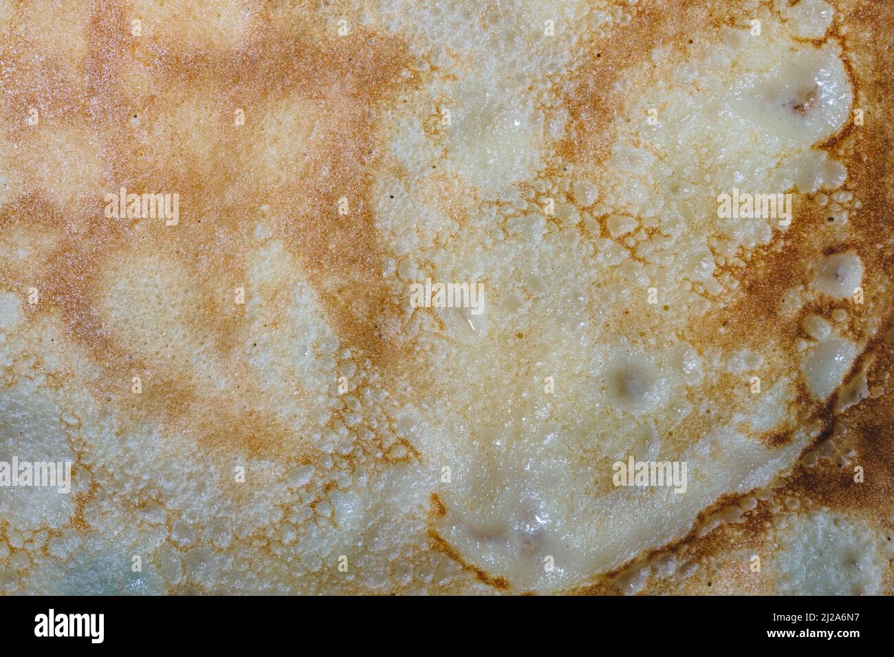 Highly detailed surface texture of a freshly baked pancake Stock Photo ...