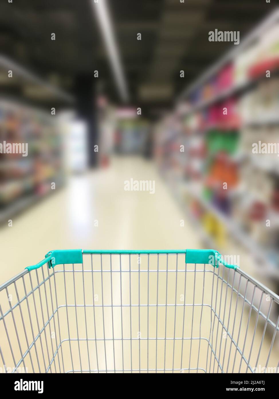 View of a shopping cart and aisle at supermarket Stock Photo - Alamy