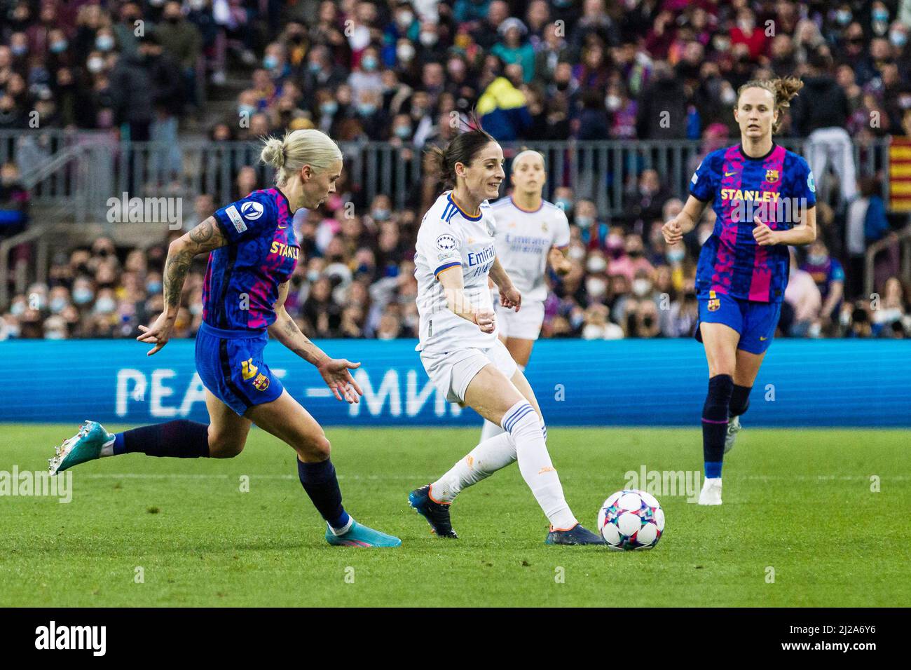 Esther Gonzalez of Real Madrid in action against Mapi Leon of FC ...