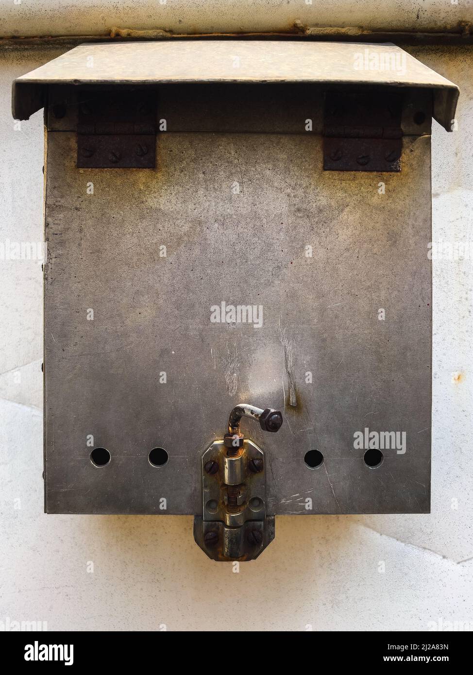 Old metal mailbox, worn rusty metallic box for post Stock Photo - Alamy