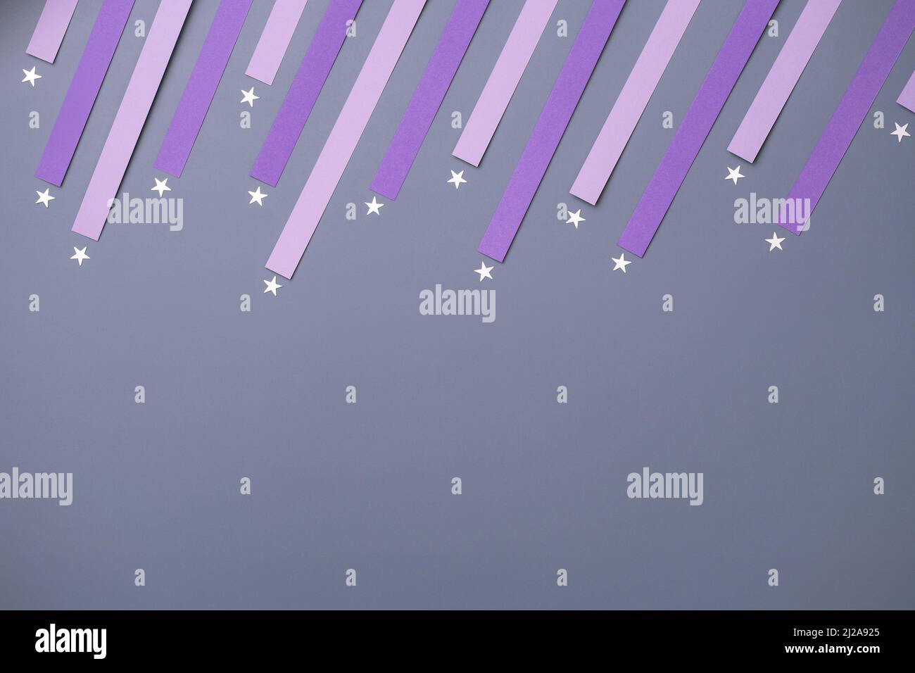 silver stars with violet paper trails on periwinkle background ...