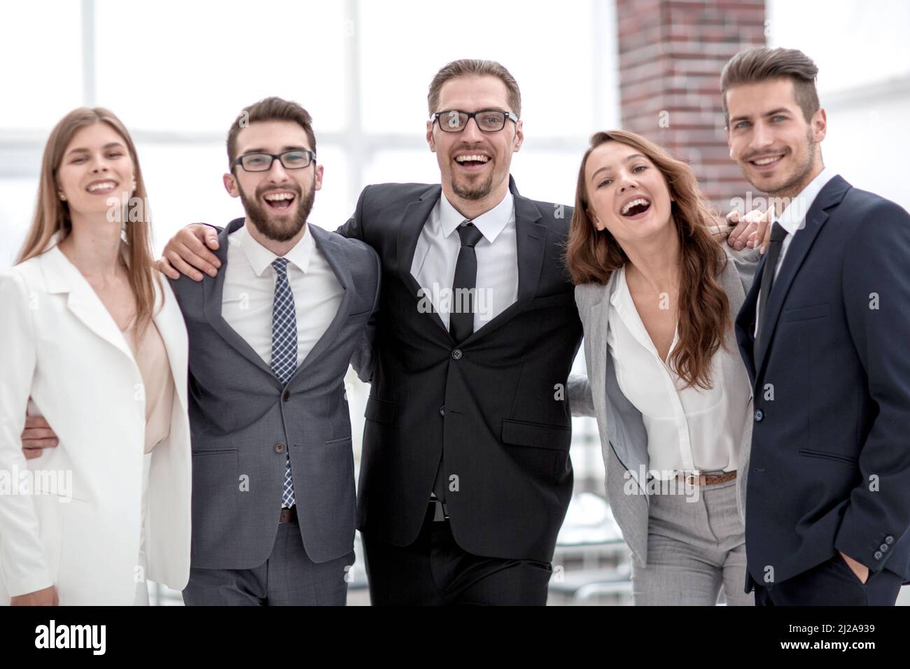 happy business team standing together Stock Photo - Alamy