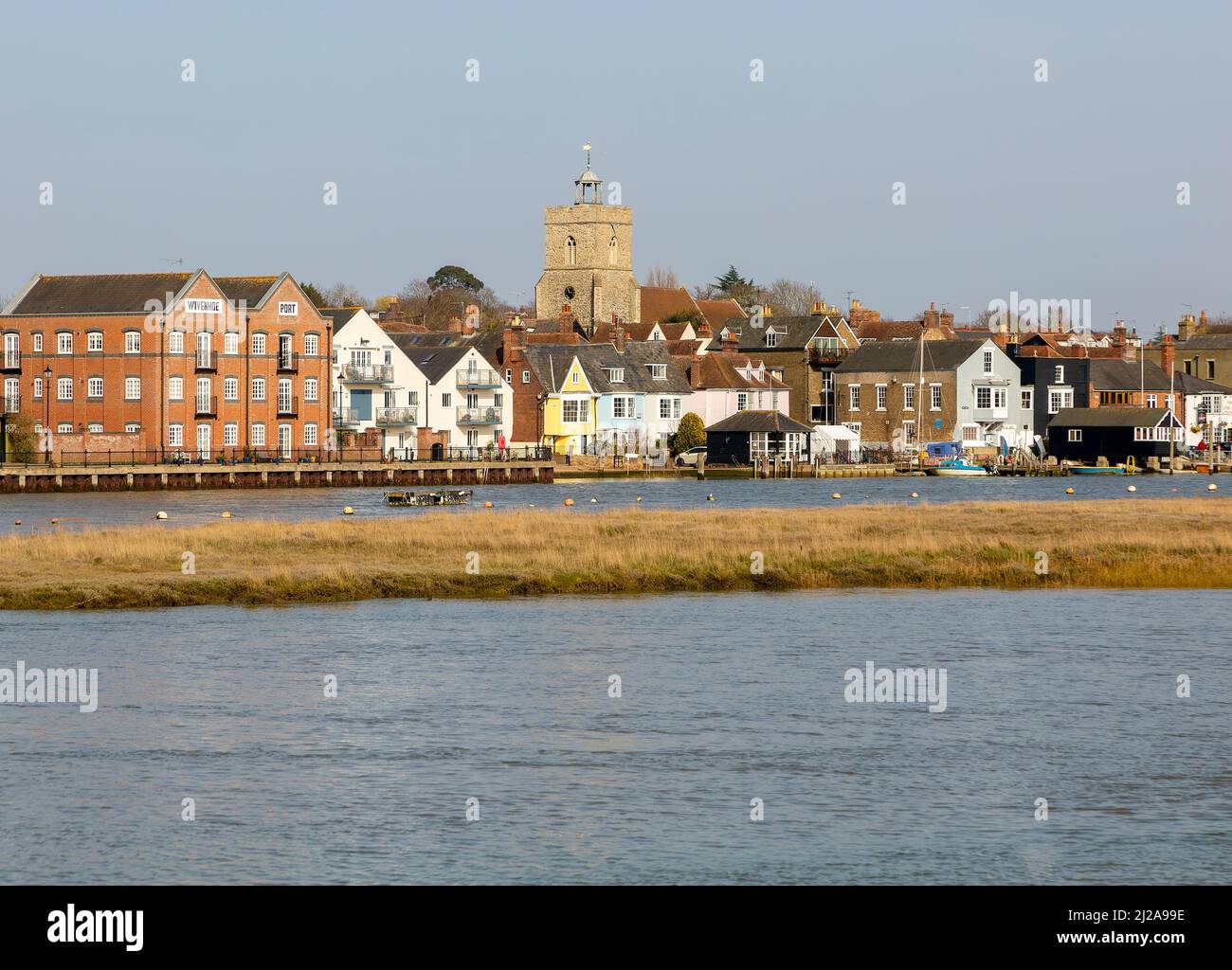 Historic buildings in village of Wivenhoe, view over River Colne, Essex ...