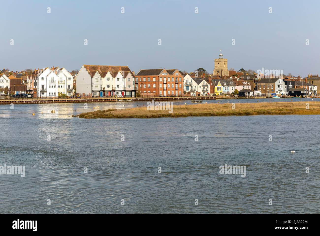 Historic buildings in village of Wivenhoe, view over River Colne, Essex ...