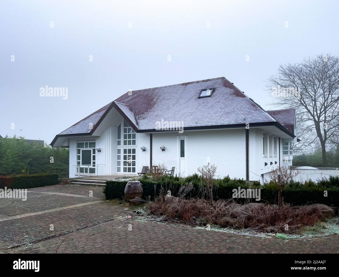 Old school house covered in snow during winter season Stock Photo - Alamy