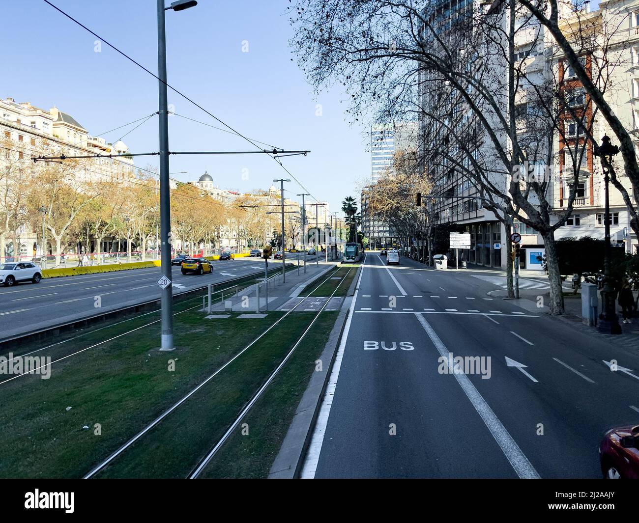 Cars driving in the road in Barcelona Stock Photo - Alamy