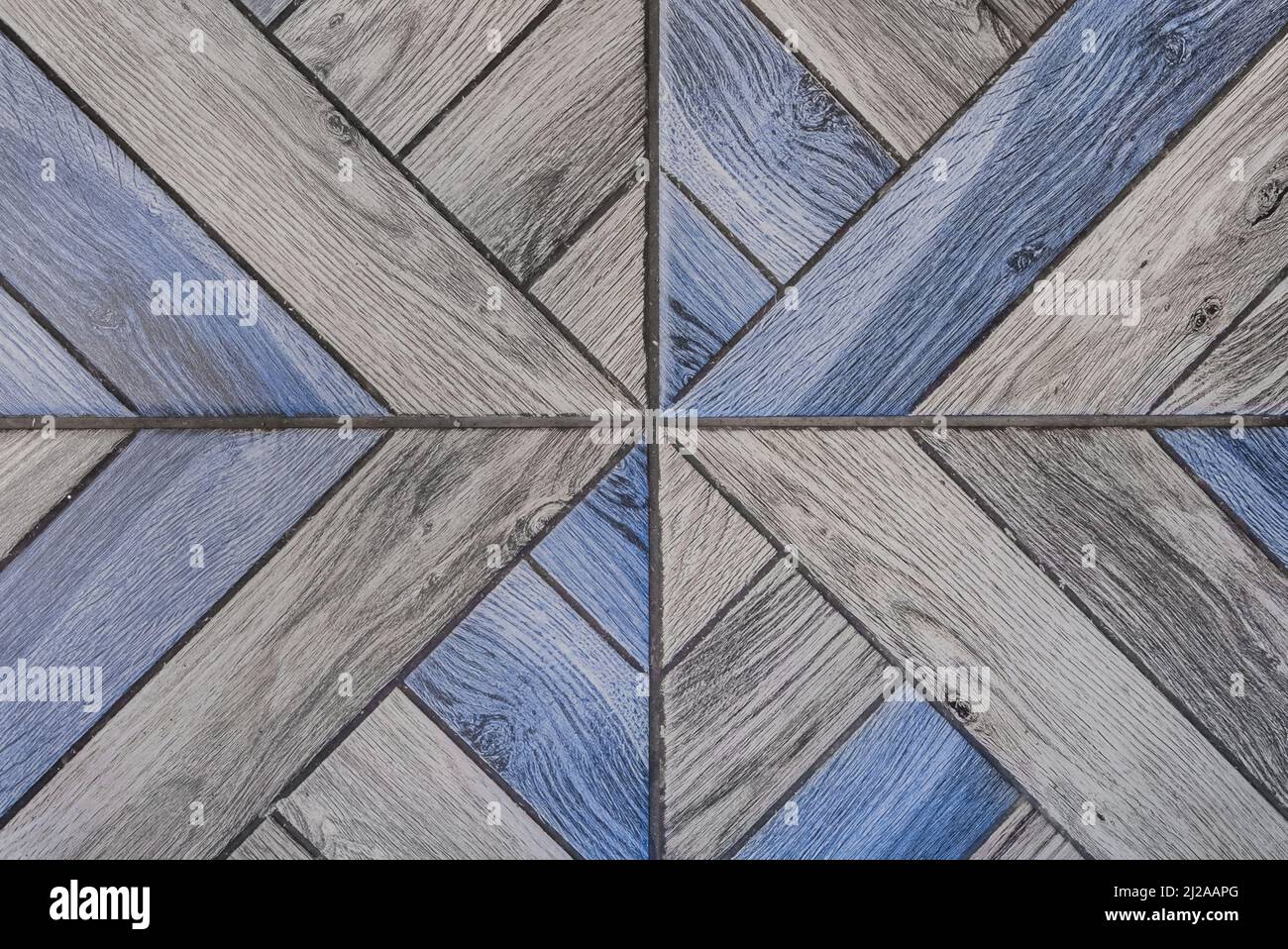 Abstract geometric floor exterior pattern with tiles and blue boards ...