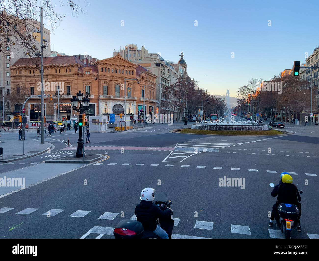 Motorbikes stopped at the red traffic light in Barcelona Stock Photo ...