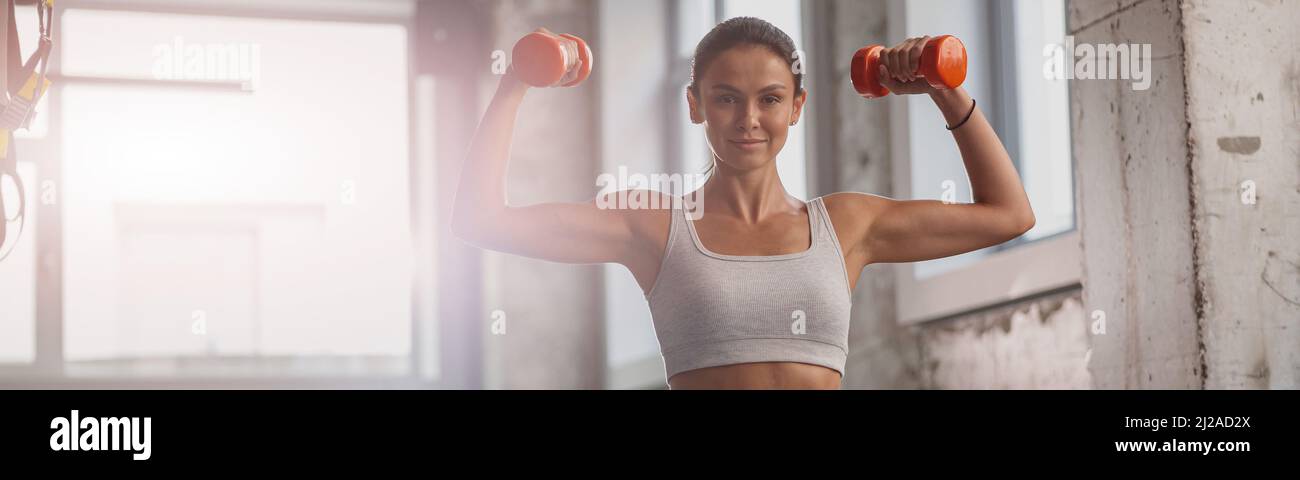 Slender lady working out in the gym Stock Photo - Alamy