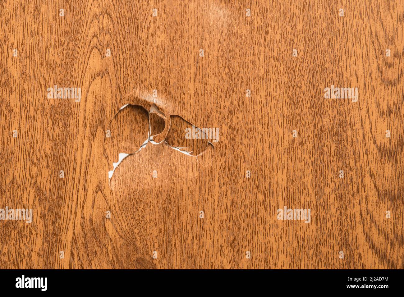 Dent on the plastic damage surface of the imitation of artificial wood ...