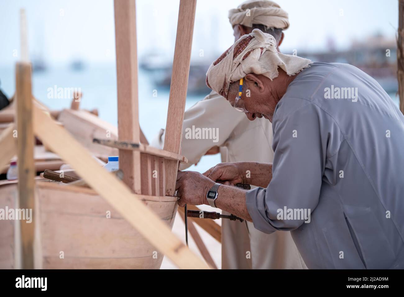 Dhow wooden boat maker. constructing dhow boat. selective focus Stock ...