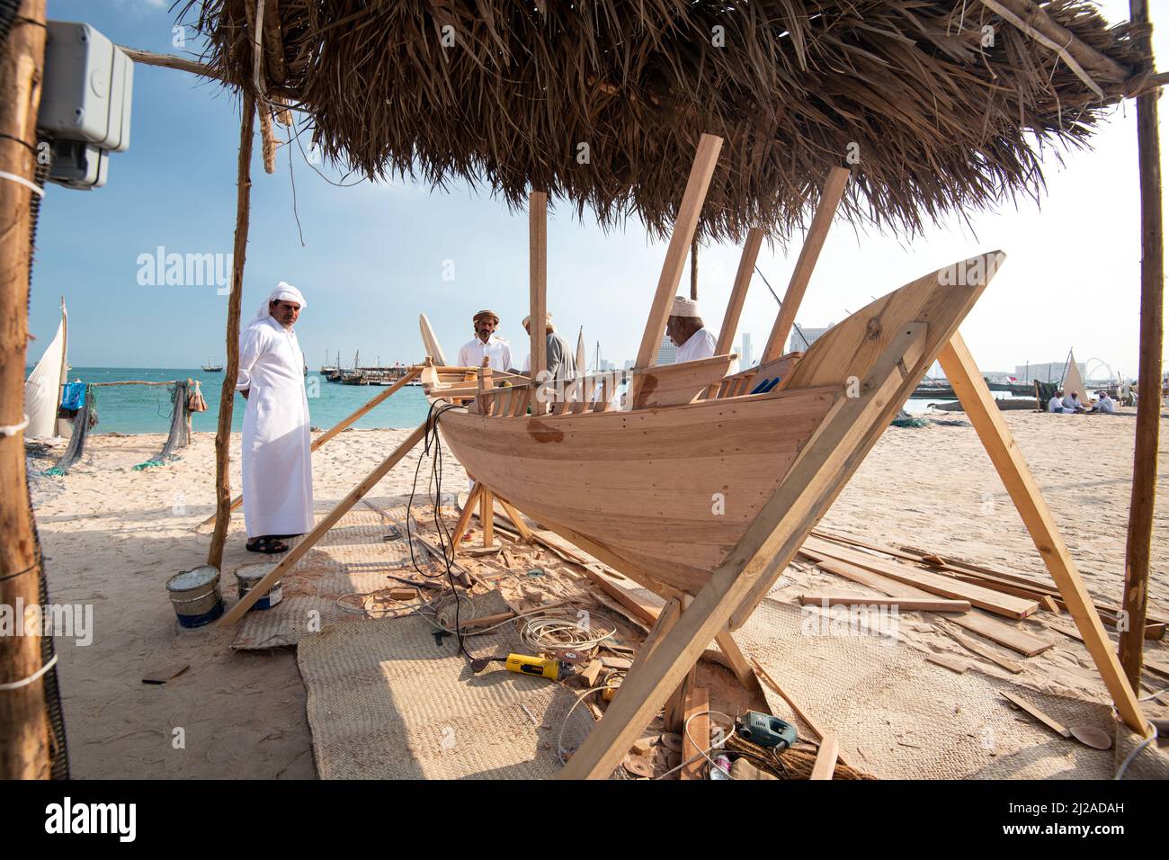 Dhow wooden boat maker. constructing dhow boat. selective focus Stock ...