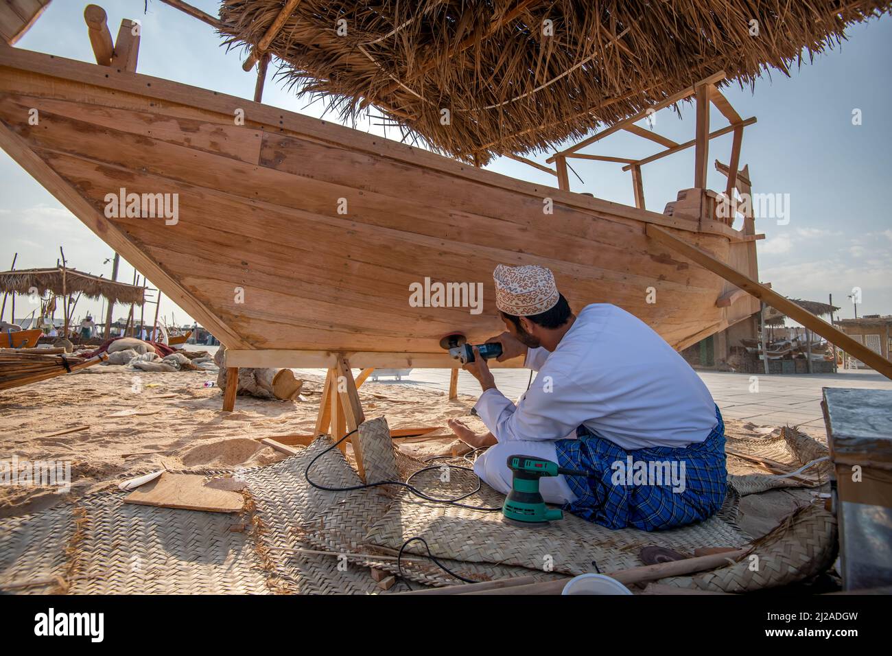 Dhow wooden boat maker. constructing dhow boat. selective focus Stock ...