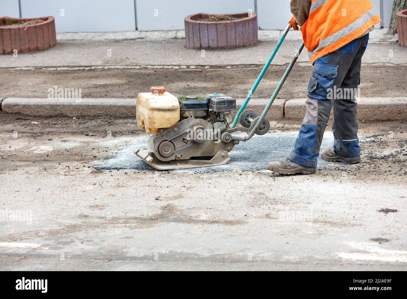 Petrol plate compactor hi-res stock photography and images - Alamy