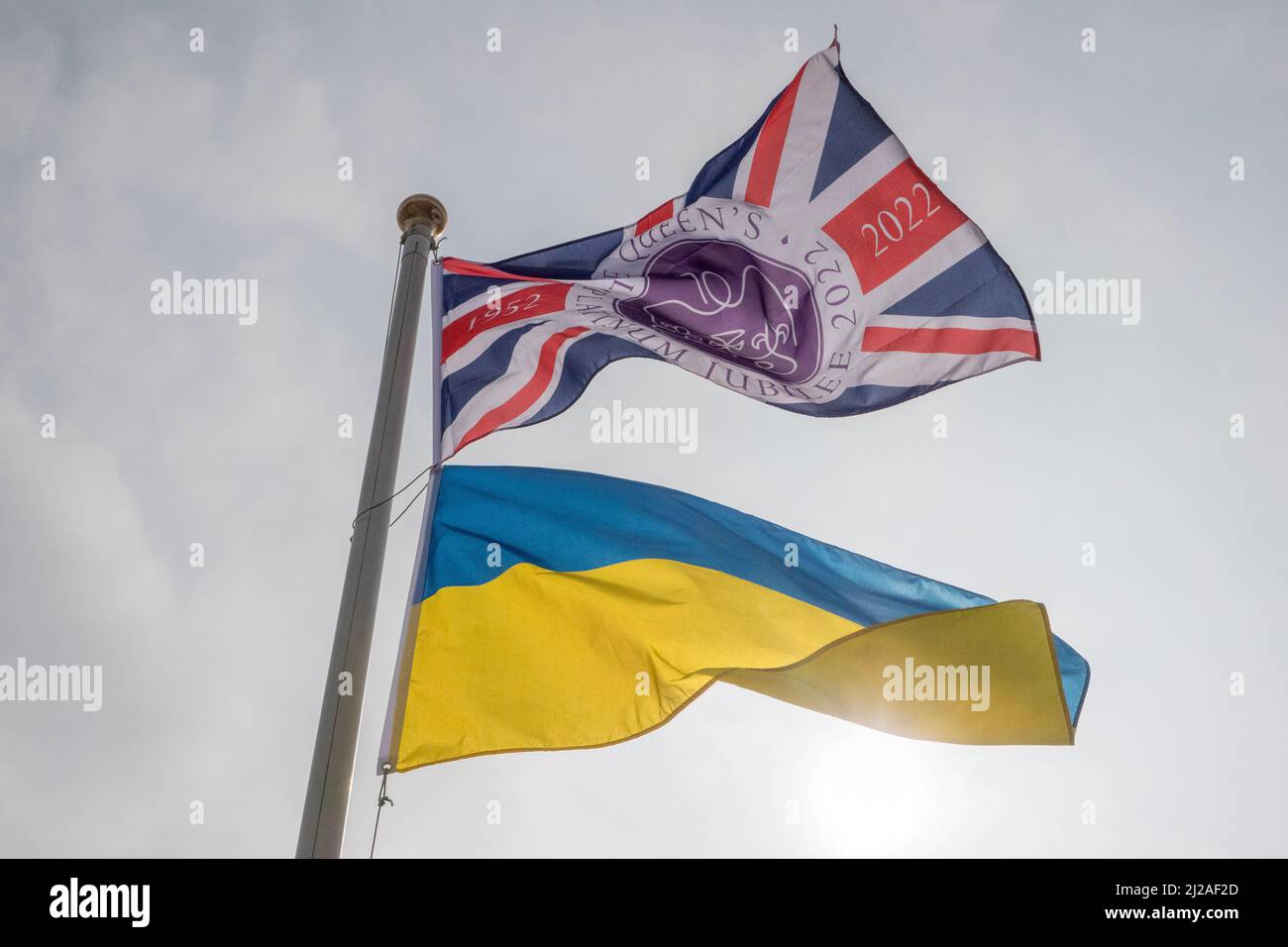 The Platinum Jubilee Union Jack flag flying on a pole along with the ...