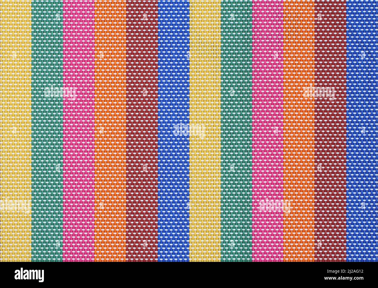 Texture - multi-colored plastic threads intertwined make up the surface ...