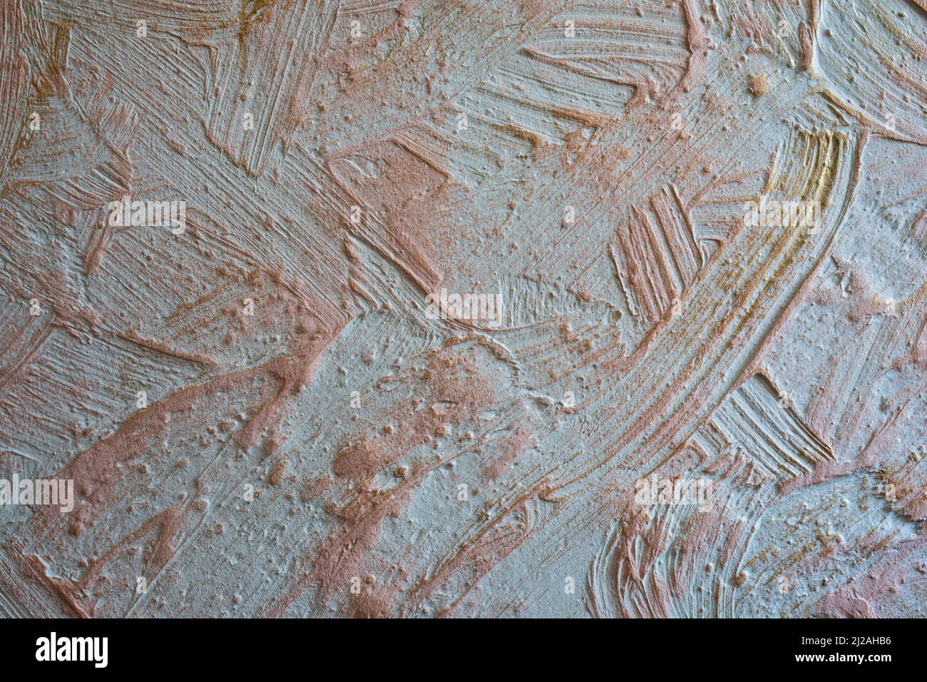 Stucco wall with gold paint Stock Photo - Alamy