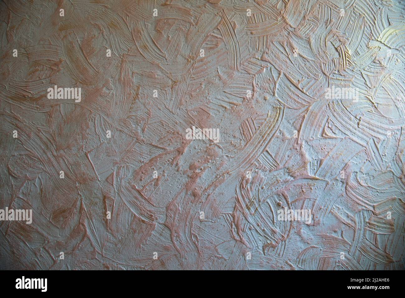 Stucco wall with gold paint Stock Photo - Alamy