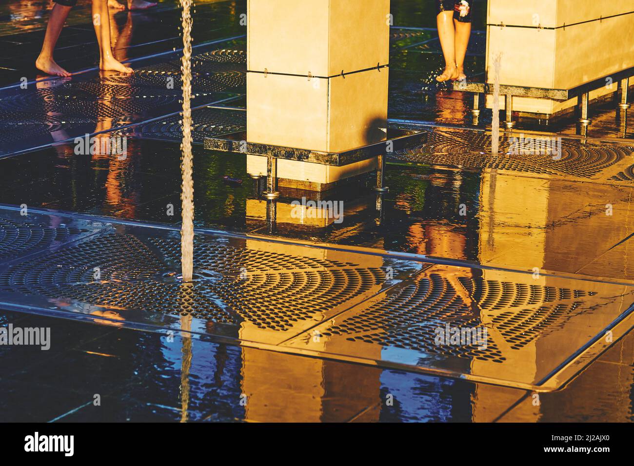 Cool water fountains flow in the summer heat Stock Photo - Alamy