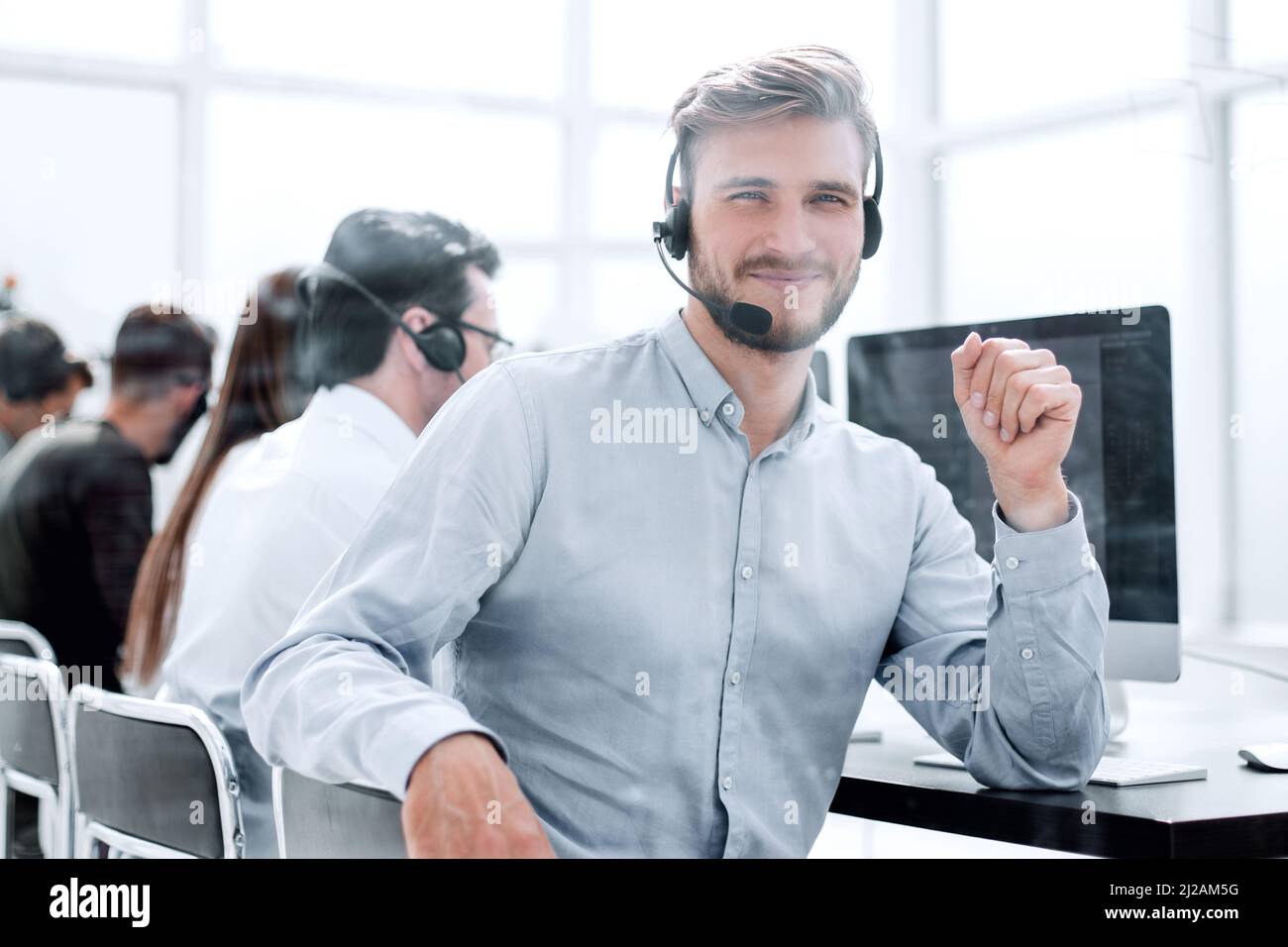 operator call center in the workplace in a bright office Stock Photo ...
