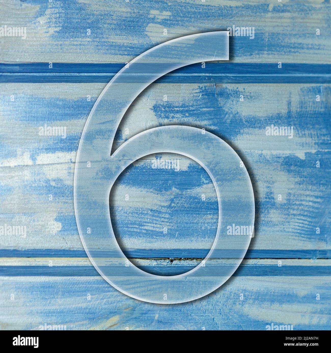 number six on wooden blue background. High quality photo Stock Photo ...