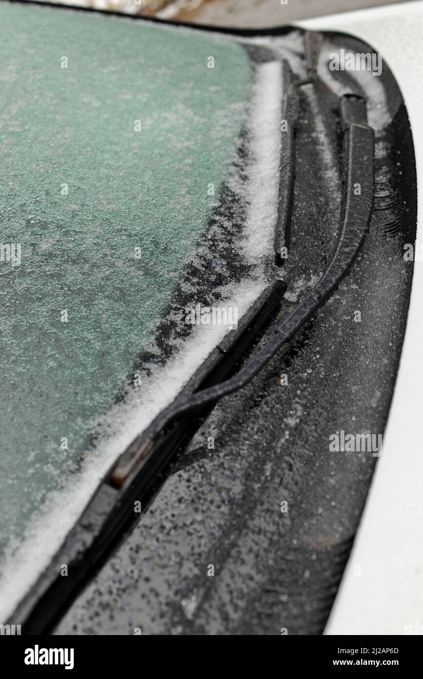Freezing Rain Creates a Layer of Ice and Coats a Passenger Vehicle ...
