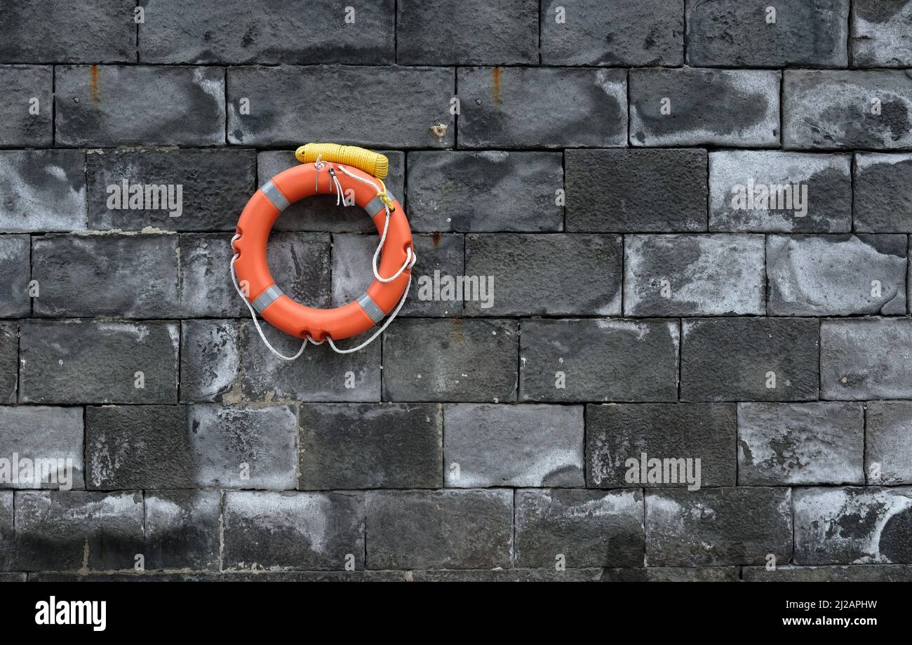 Harbor wall with lifebuoy hi-res stock photography and images - Alamy