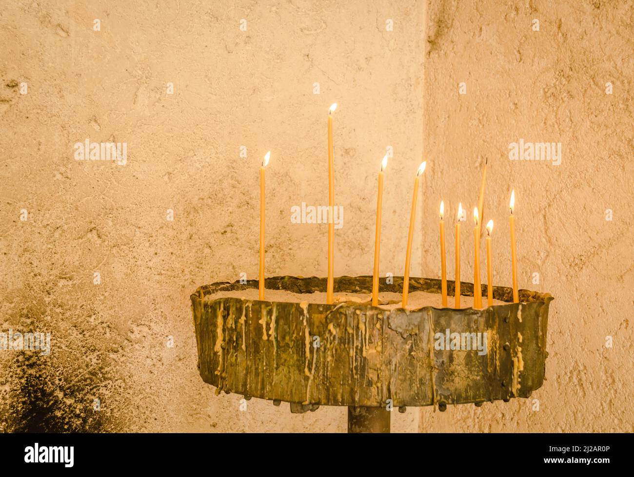 The place for lighting candles in the monastery. Kovilj Monastery is a ...