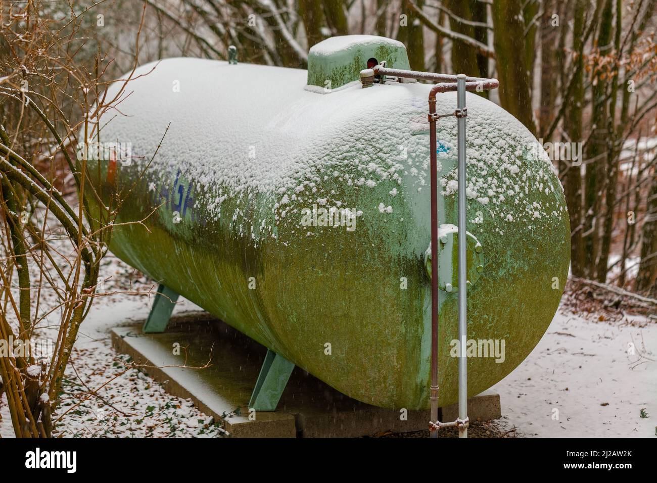 a liquid gas tank in a garden Stock Photo - Alamy