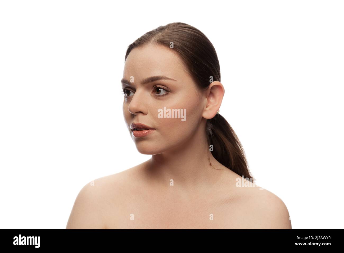 Portrait of beautiful woman with no makeup face with ponytail looking ...