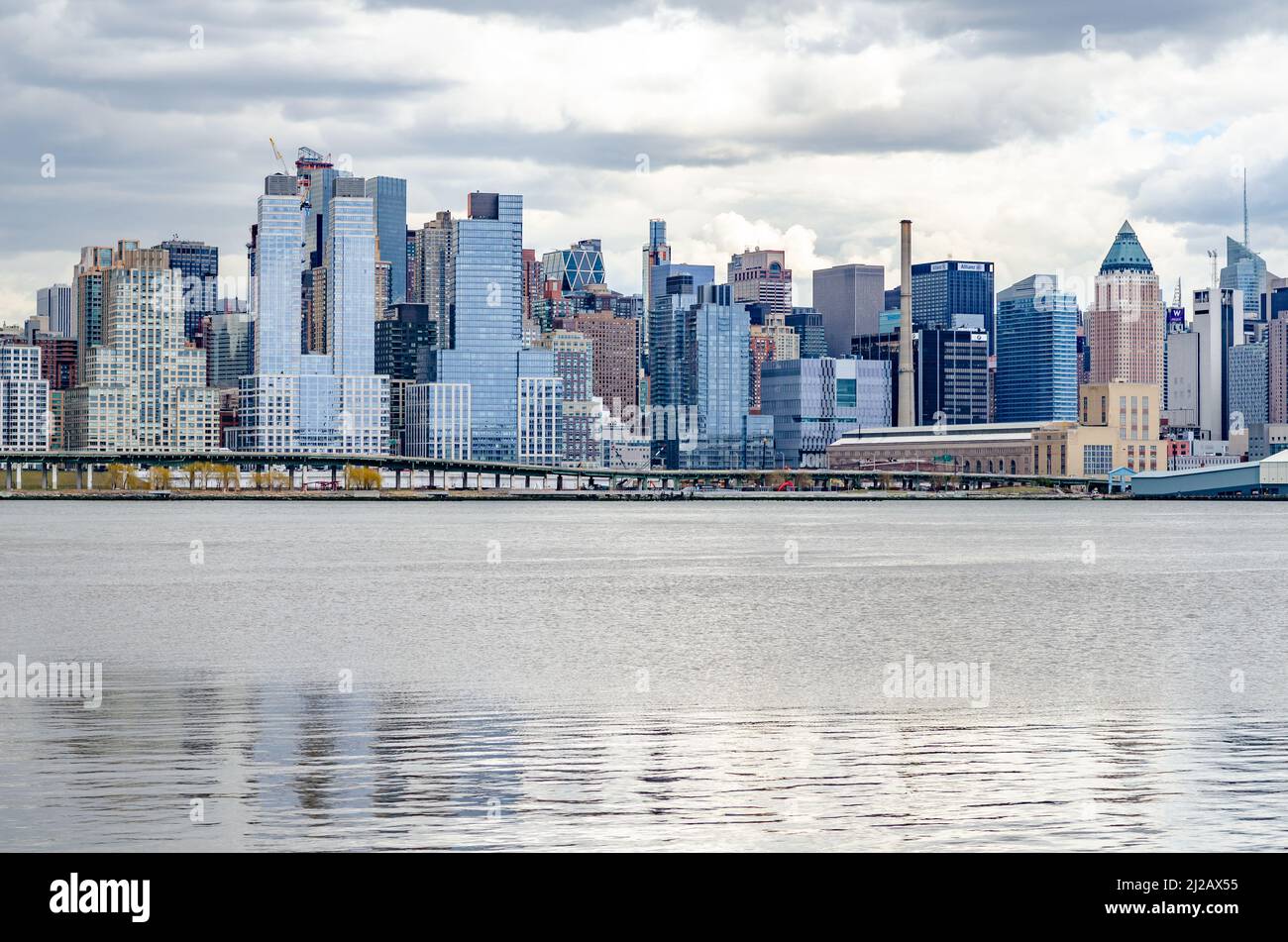 View of Manhattan, New York City Skyline with bridge and Hudson river ...