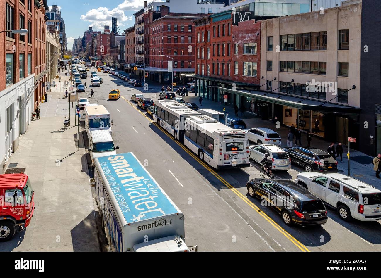 Chelsea city Street with cars parked next to the street and traffic ...