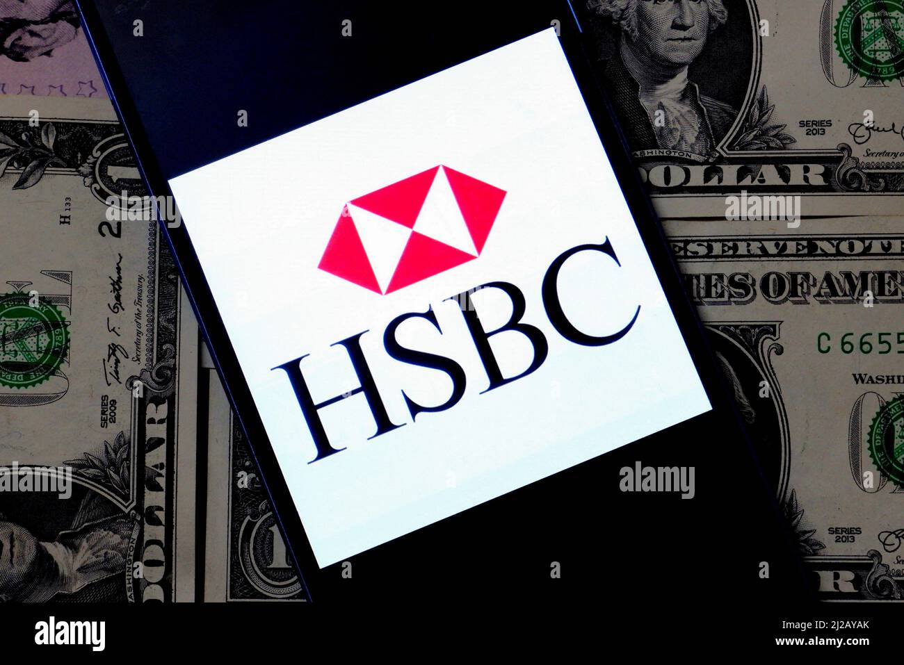 In this photo illustration, a HSBC bank logo seen displayed on a ...