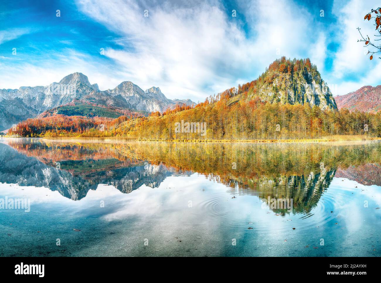 Picturesque autumn scene of sunny morning on Almsee lake. Poppular ...