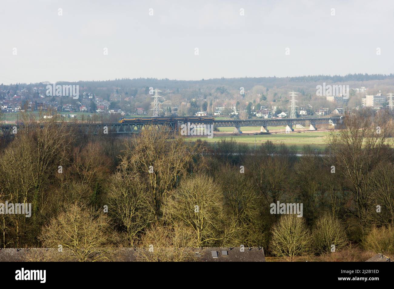 Aerial view of a railway bridge with train in Arnhem in the Netherlands ...